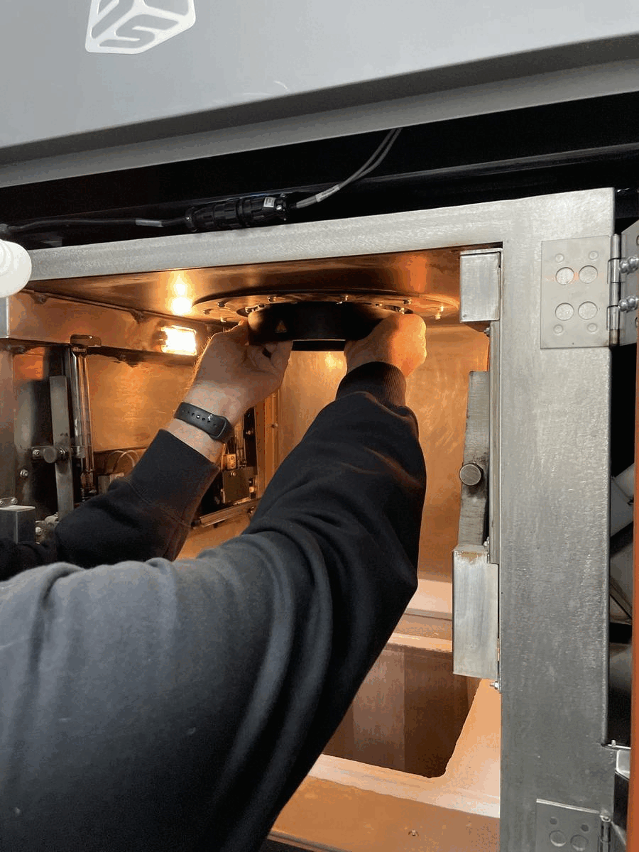 SLS 380 Remove the Print Cake from the Process Chamber