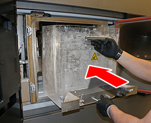 SLS 380 Remove the Print Cake from the Process Chamber